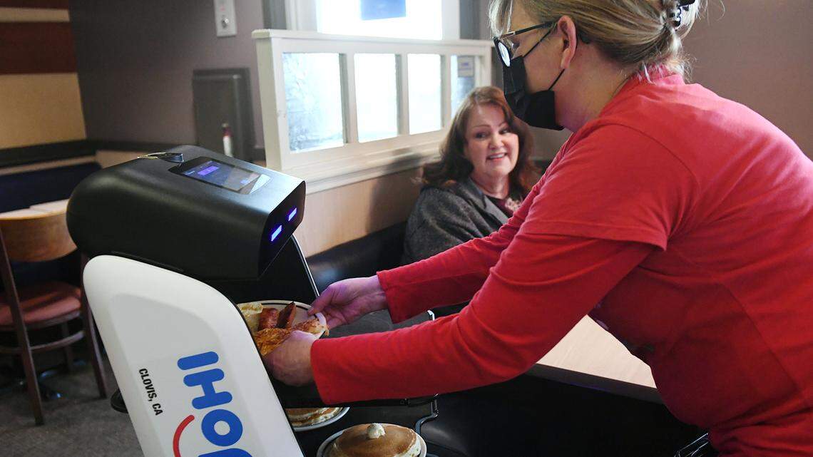IHOP restaurant robot serving customers food in Clovis, CA | Fresno Bee