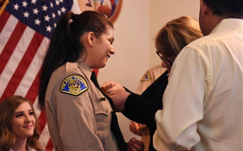 Tulare County sheriff swears in first trainee under scholarship program ...